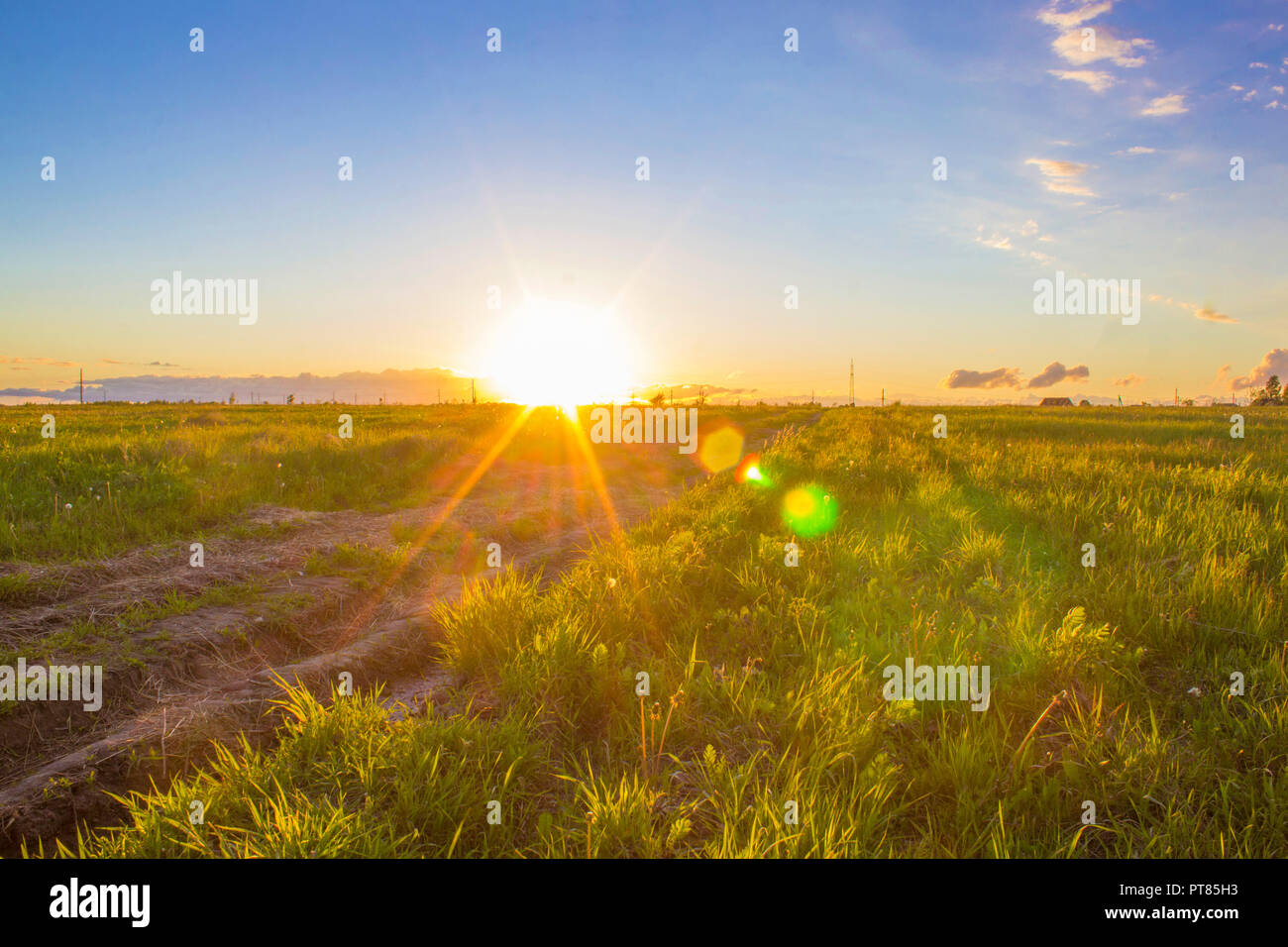 Very Beautiful Rural Landscape of Sunset on field with Bright Glare of ...