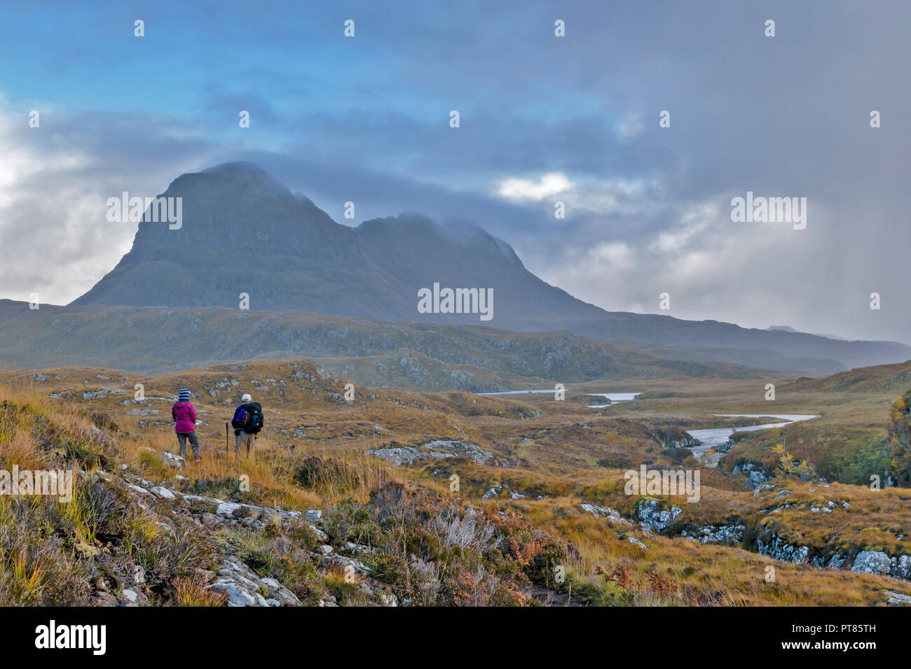 SUILVEN AND RIVER KIRKAIG SUTHERLAND SCOTLAND WALKERS WATCHING A RAIN ...