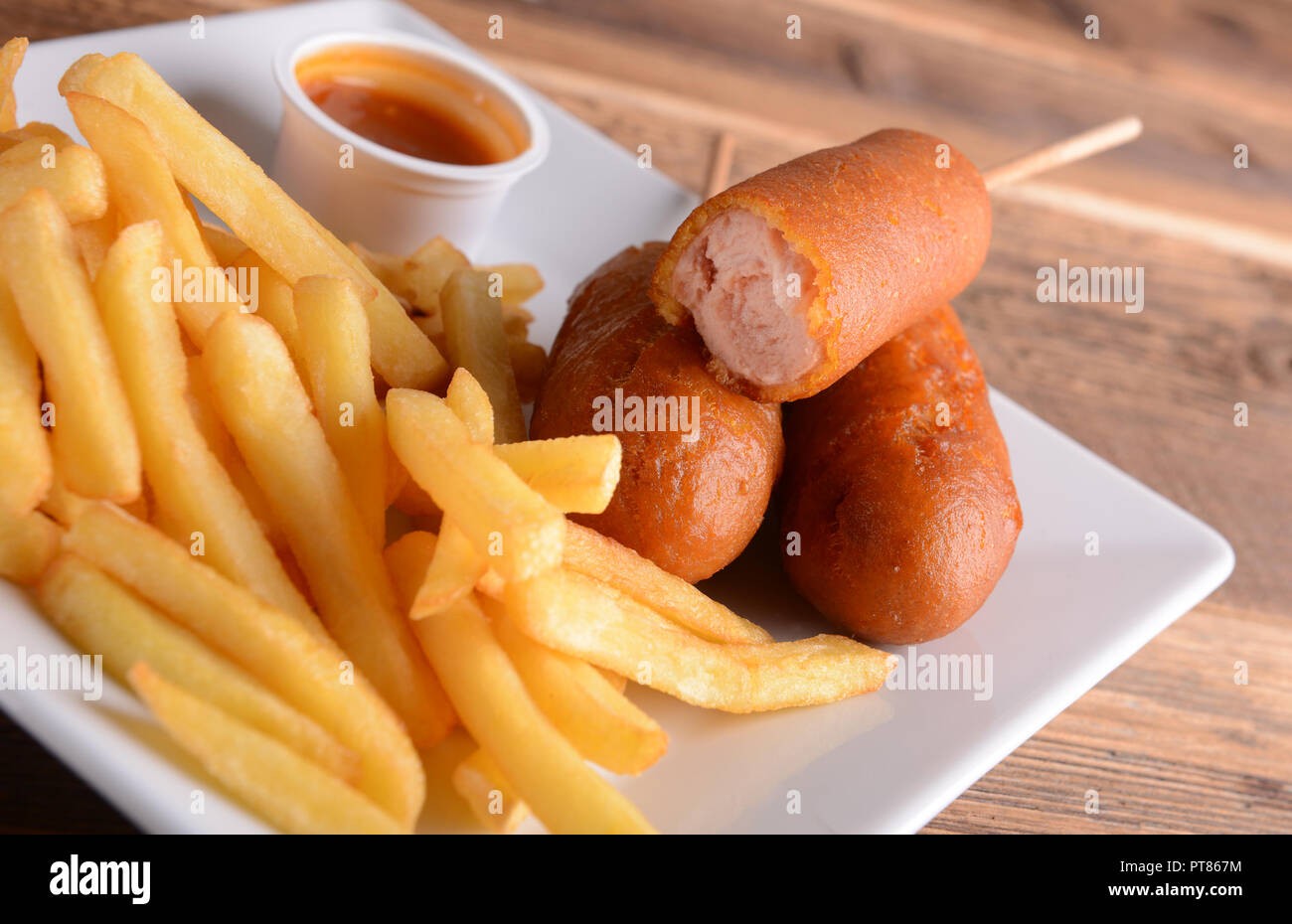 Corn dogs with fries Stock Photo - Alamy