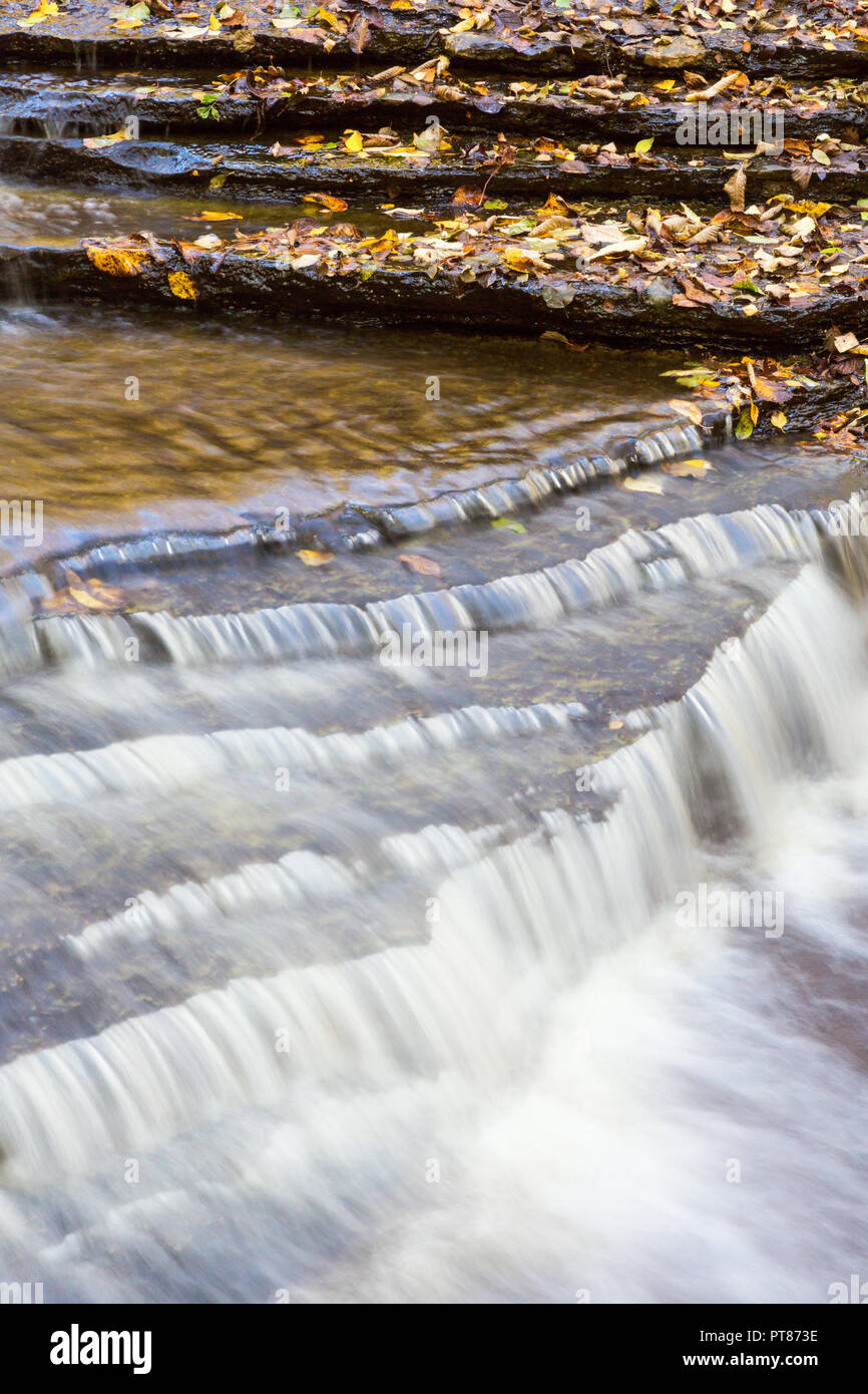 Water flowing over shale stone Stock Photo - Alamy