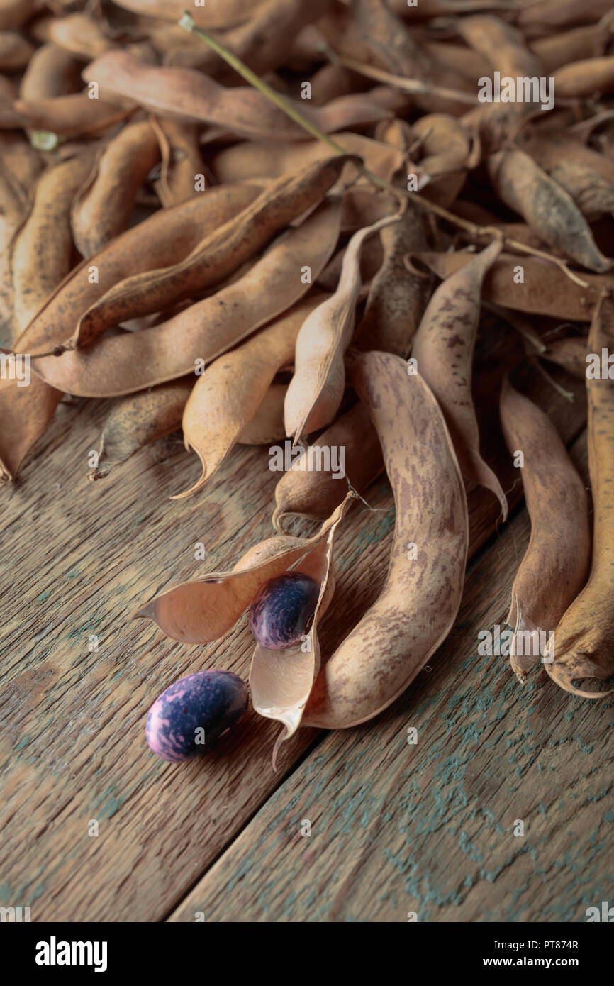 Dry bean pods, healthy organic food. Old wooden background Stock Photo ...