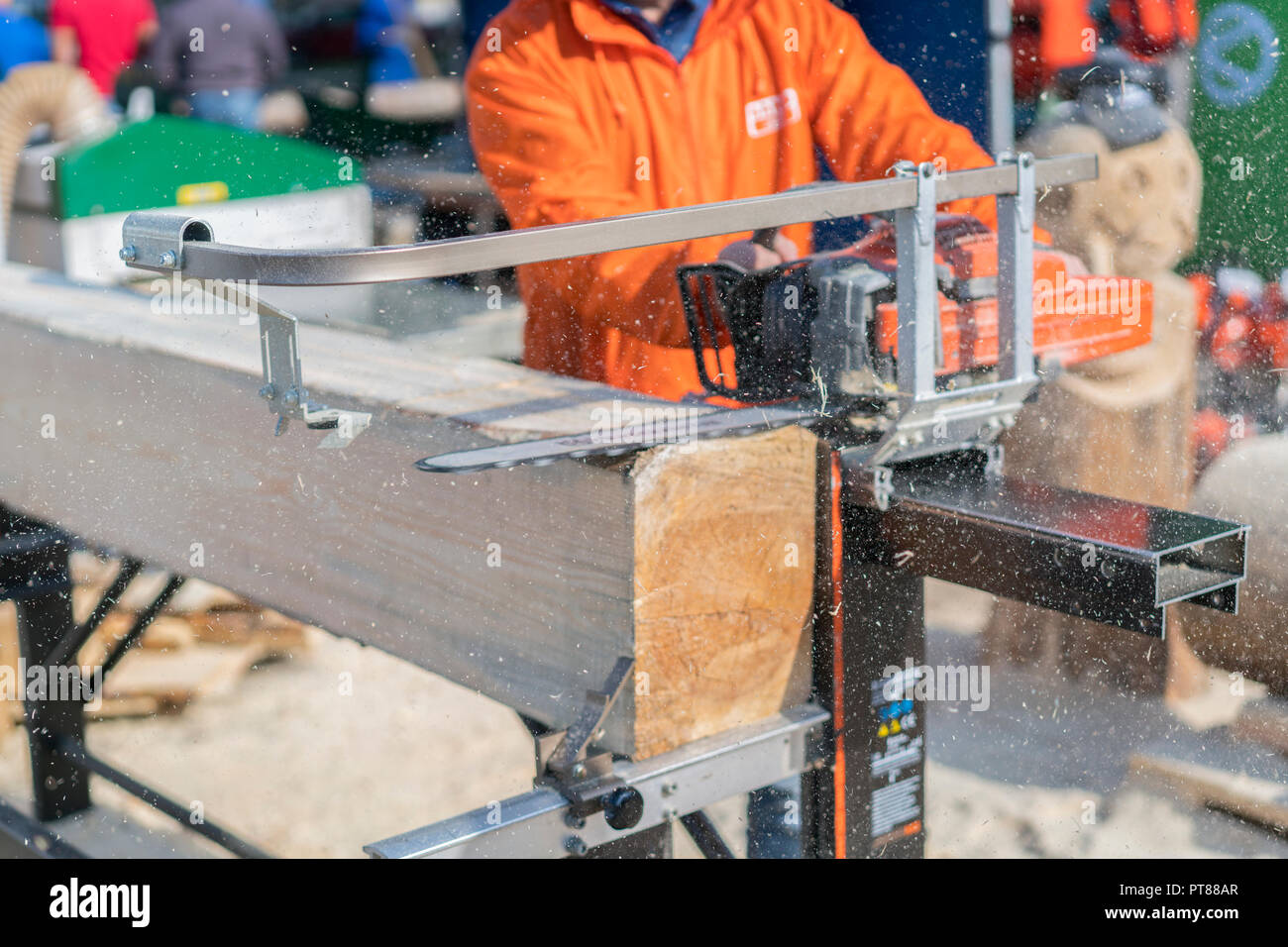 Man cutting wood chainsaw sawmill hi-res stock photography and images ...