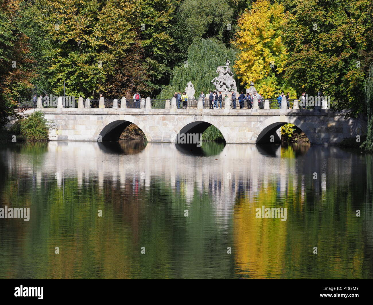 Scenic white bridge in baths park landscapes in Warsaw, european ...