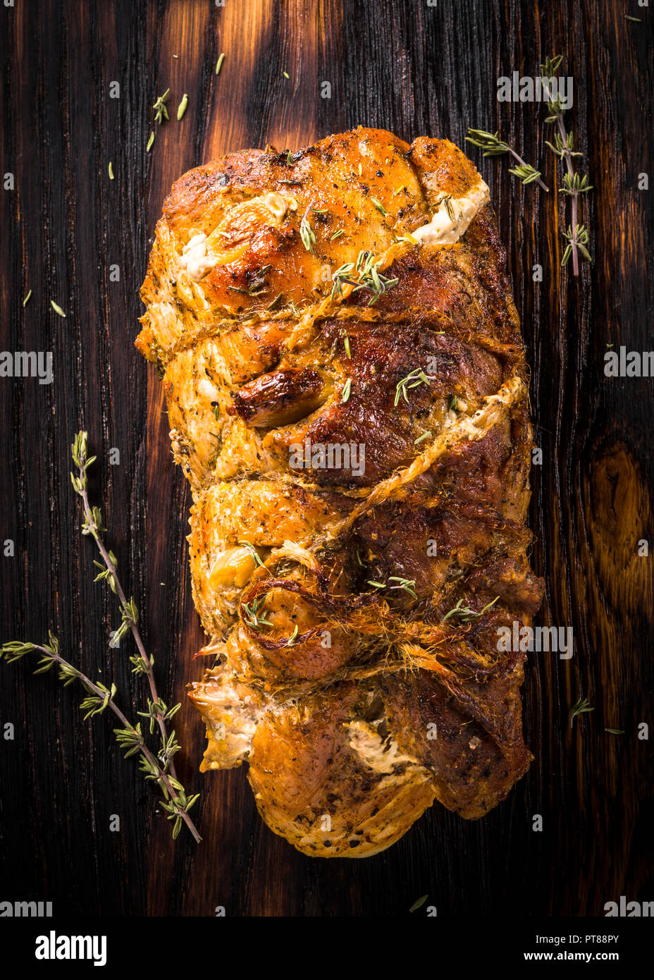 Baked pork meat. Top view on black Stock Photo - Alamy
