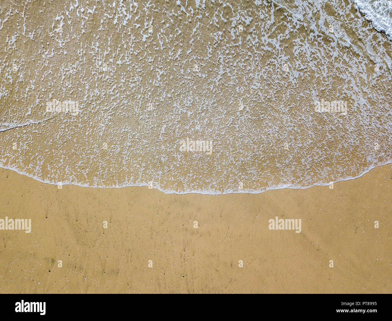 Water ripples on the sandy beach Photographed at Huntington Beach ...