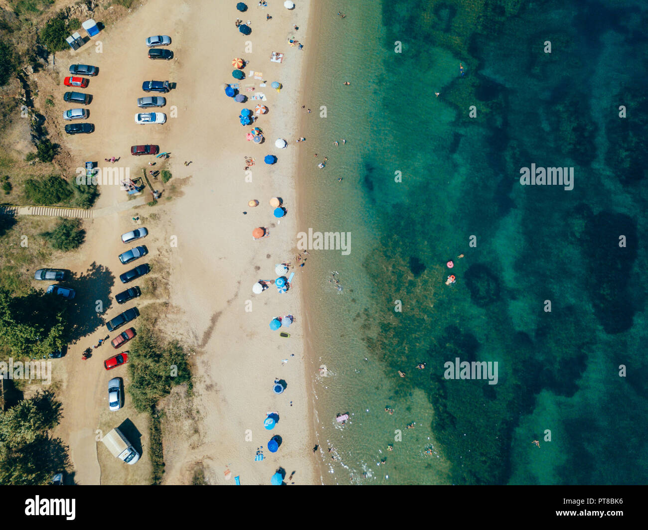 Beach with sun beds, view from above Stock Photo - Alamy