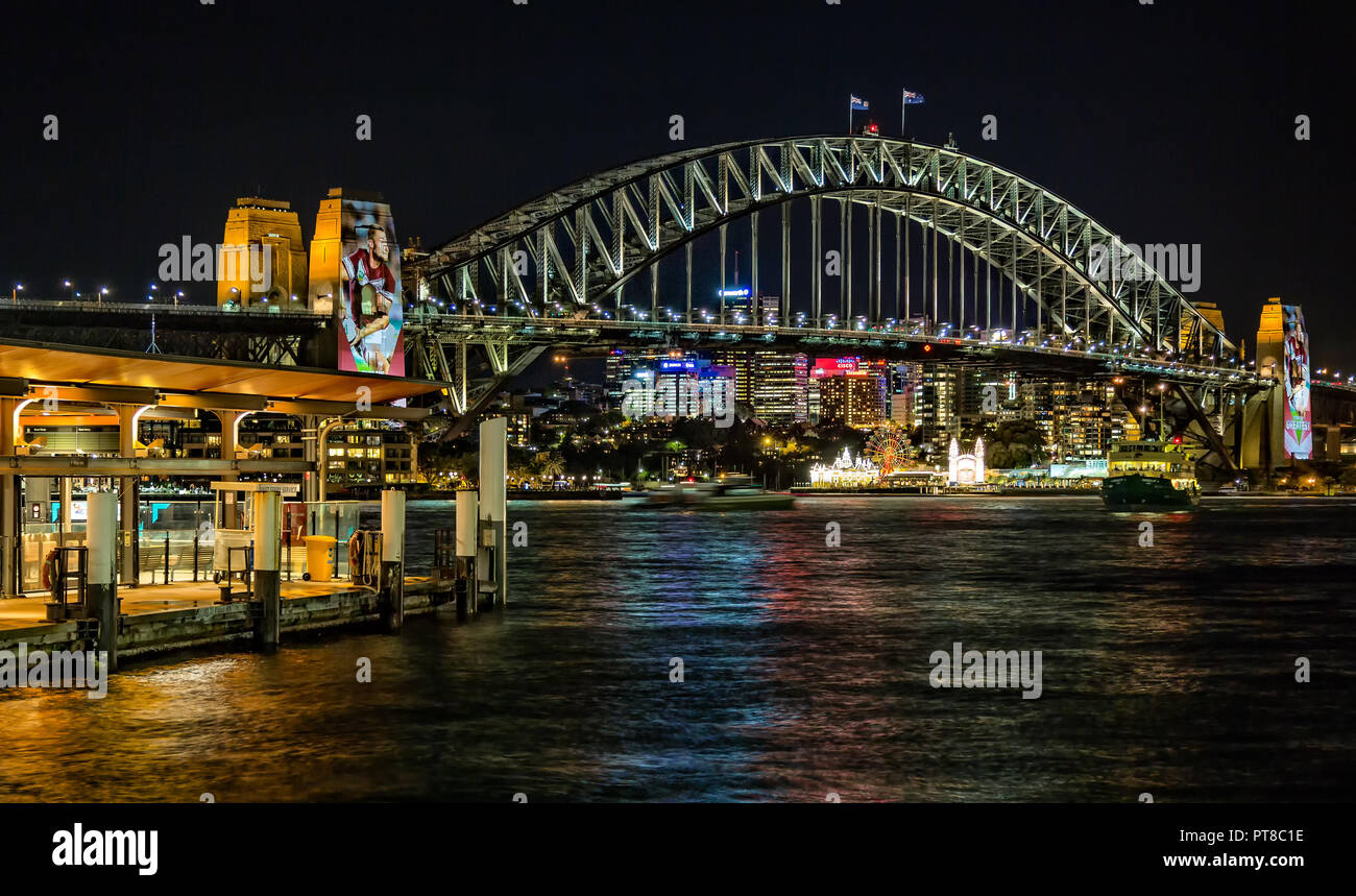Sydney Harbour Bridge illuminated at night from Circular Quay in Sydney ...