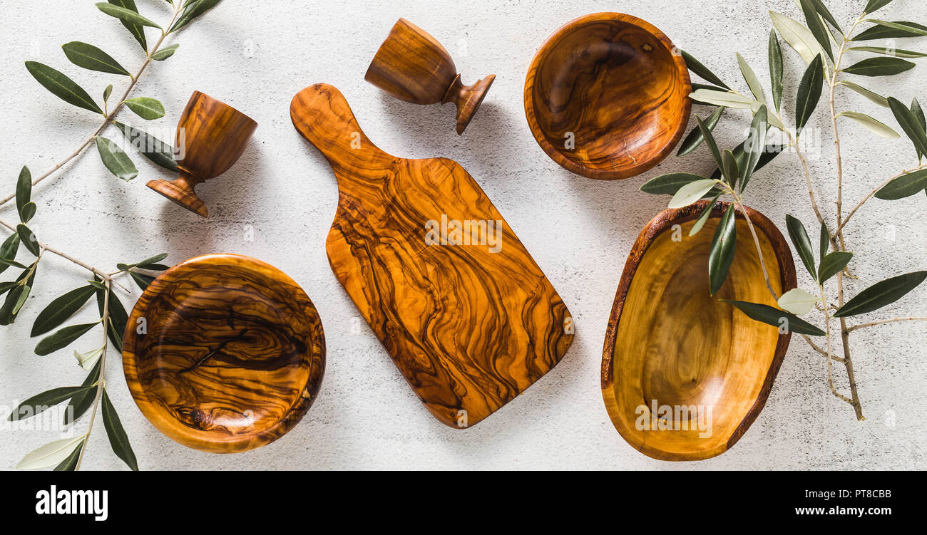 banner of wooden utensils from the olive tree on the white kitchen ...