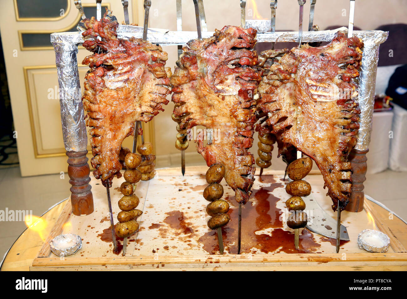 Barbecue is prepared of lamb or sheep meat and processed by slasher ...