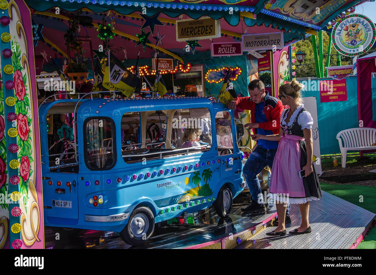 Childrens roundabout at munich oktoberfest hi-res stock photography and ...
