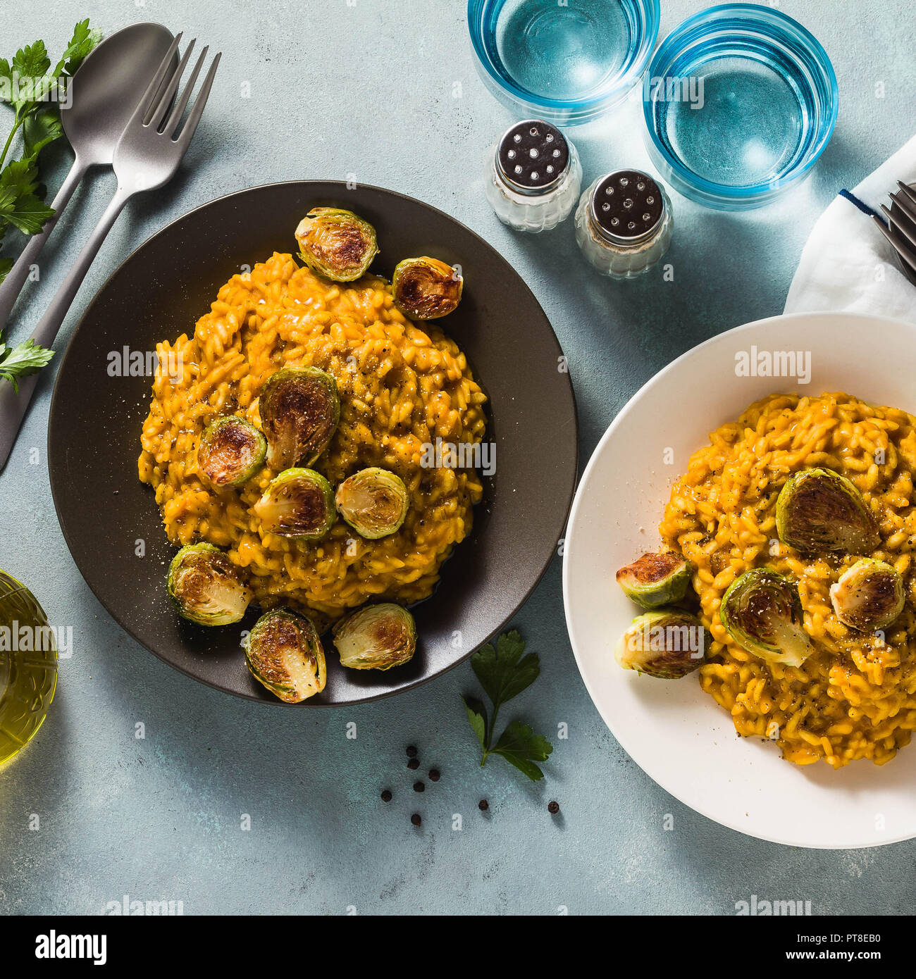 risotto with pumpkin and brussels sprouts on the table. A healthy ...