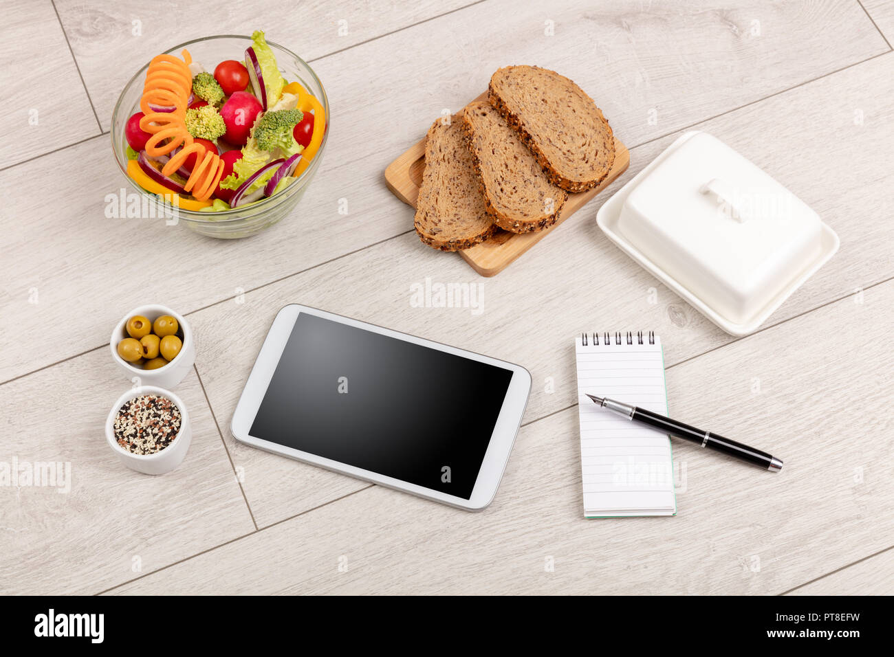 Healthy food composition with empty tablet Stock Photo - Alamy