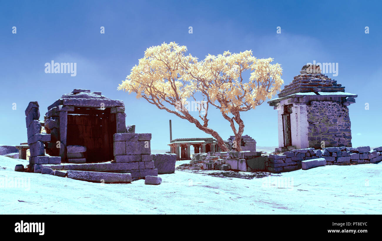 Hanuman temple on the Hemakuta hill temple complex in Hampi in infrared ...