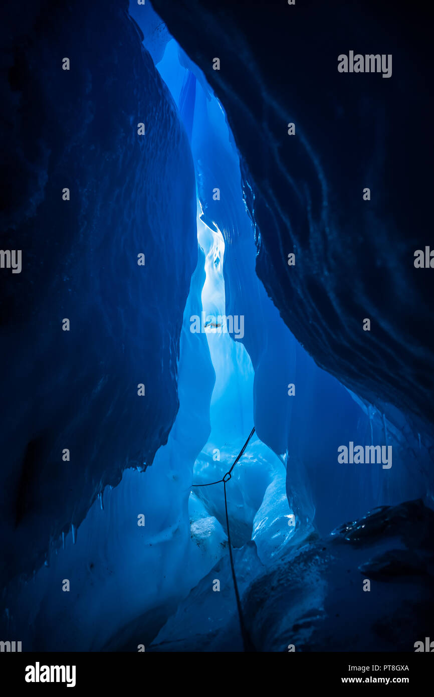 Inside of a huge moulin or crevasse tunnel, nearly 30 meters under the ...