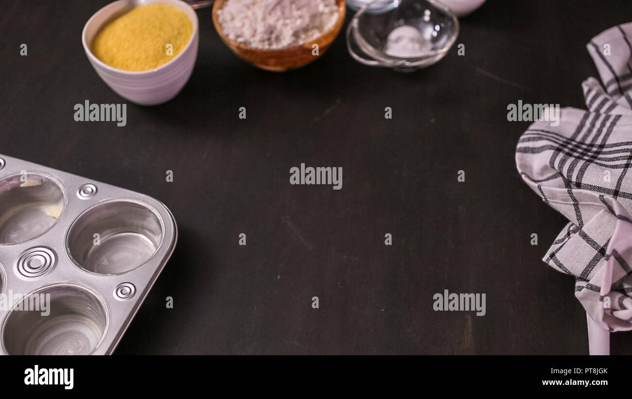 Step by step. Buttering metal cupcake pan to bake cornbread muffins ...