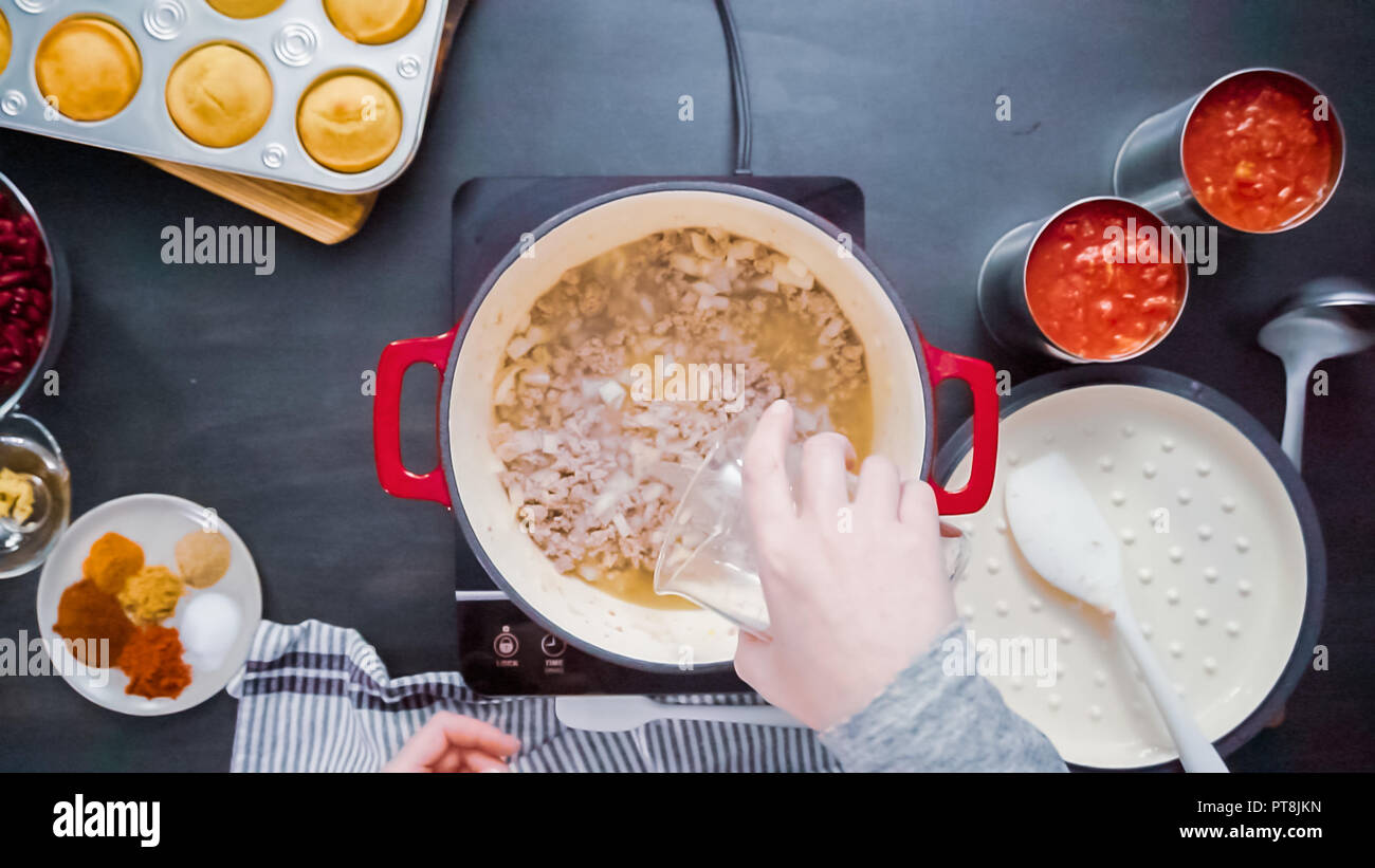 Step by step. Top view. Cooking turkey chili in enameled cast iron ...