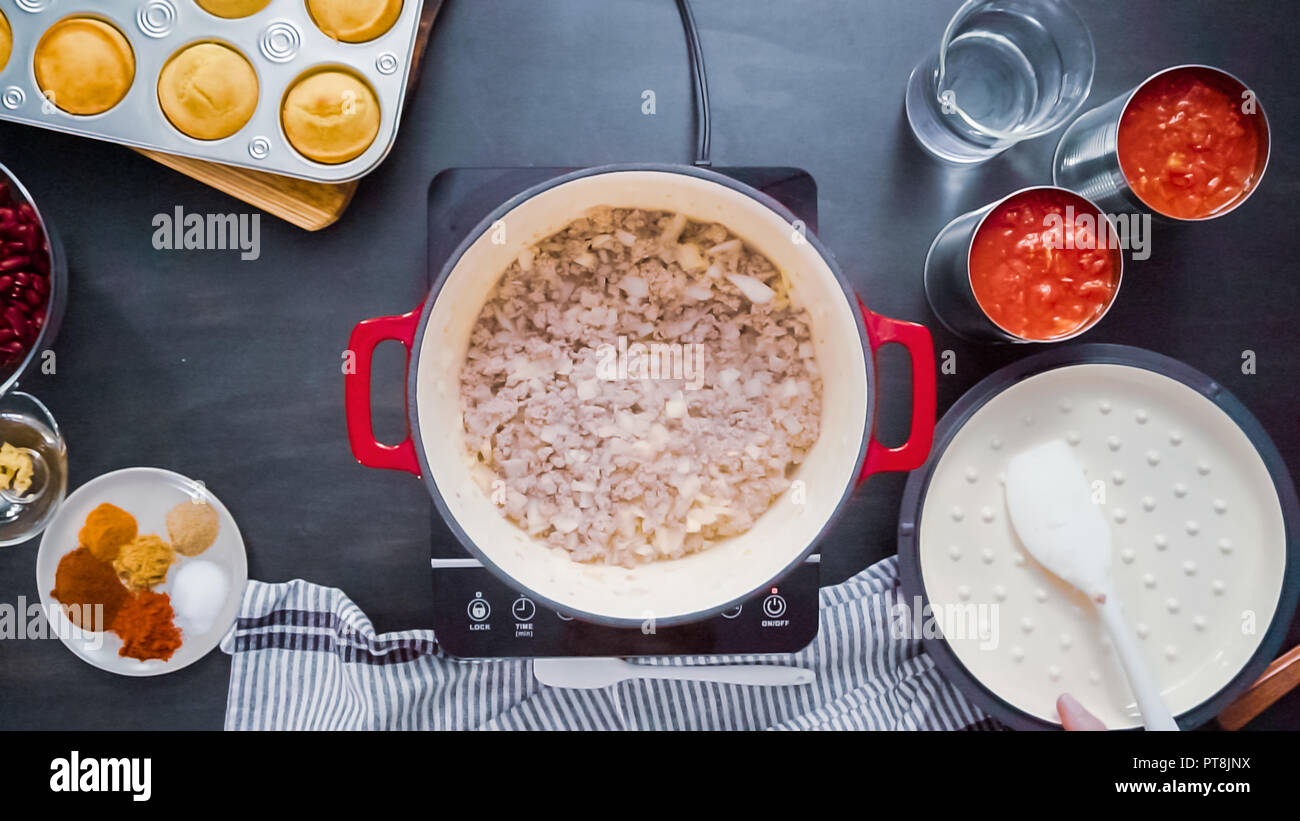 Step by step. Top view. Cooking turkey chili in enameled cast iron ...