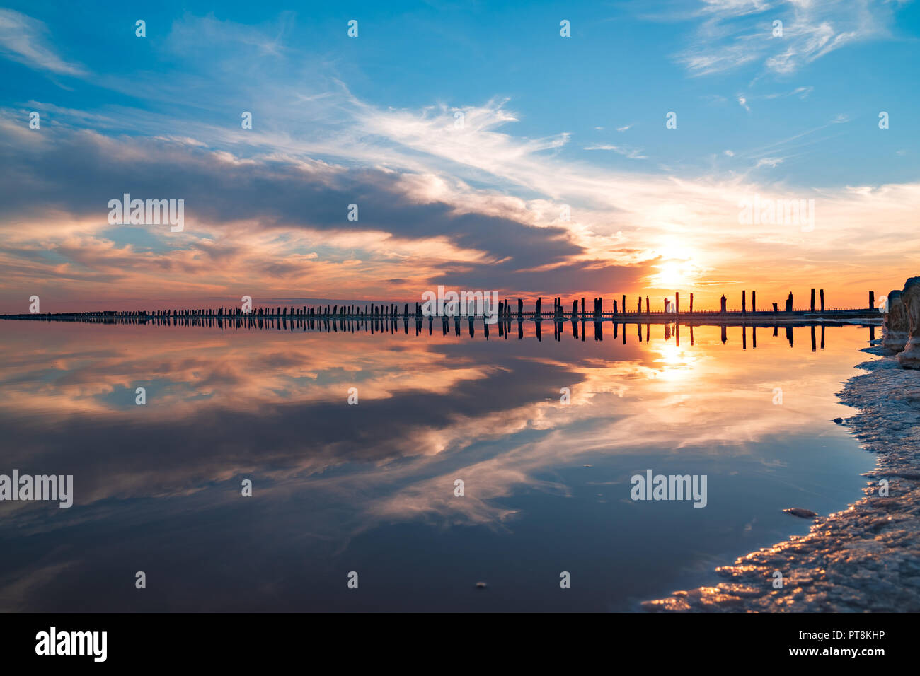 Salt sea water evaporation ponds with pink plankton colour Stock Photo ...