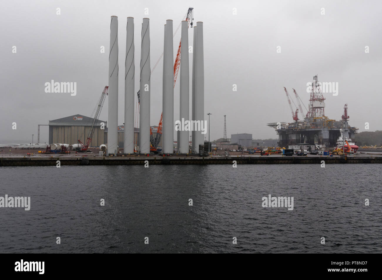 Wind Turbine masts in the Port of Nigg, Scotland Stock Photo - Alamy