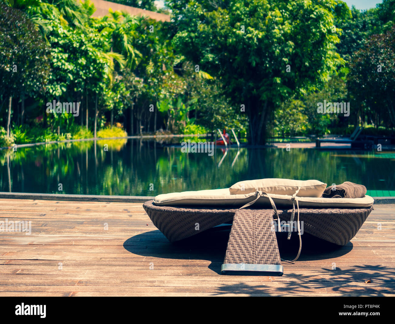 luxury swimming pool at tropical hotel resort, relaxing and leisure ...