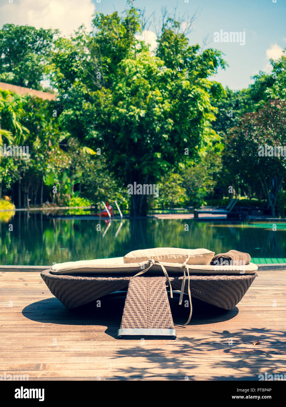 luxury swimming pool at tropical hotel resort, relaxing and leisure ...