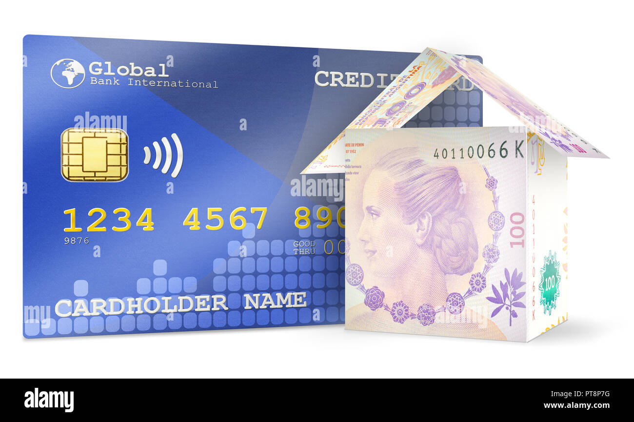 Money bills folded like houses standing next to a credit card ...