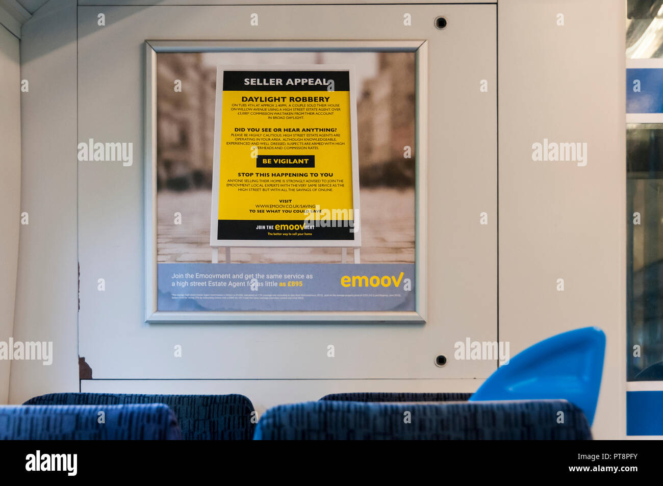 An advertisement for emoov online estate agents on a South East train ...