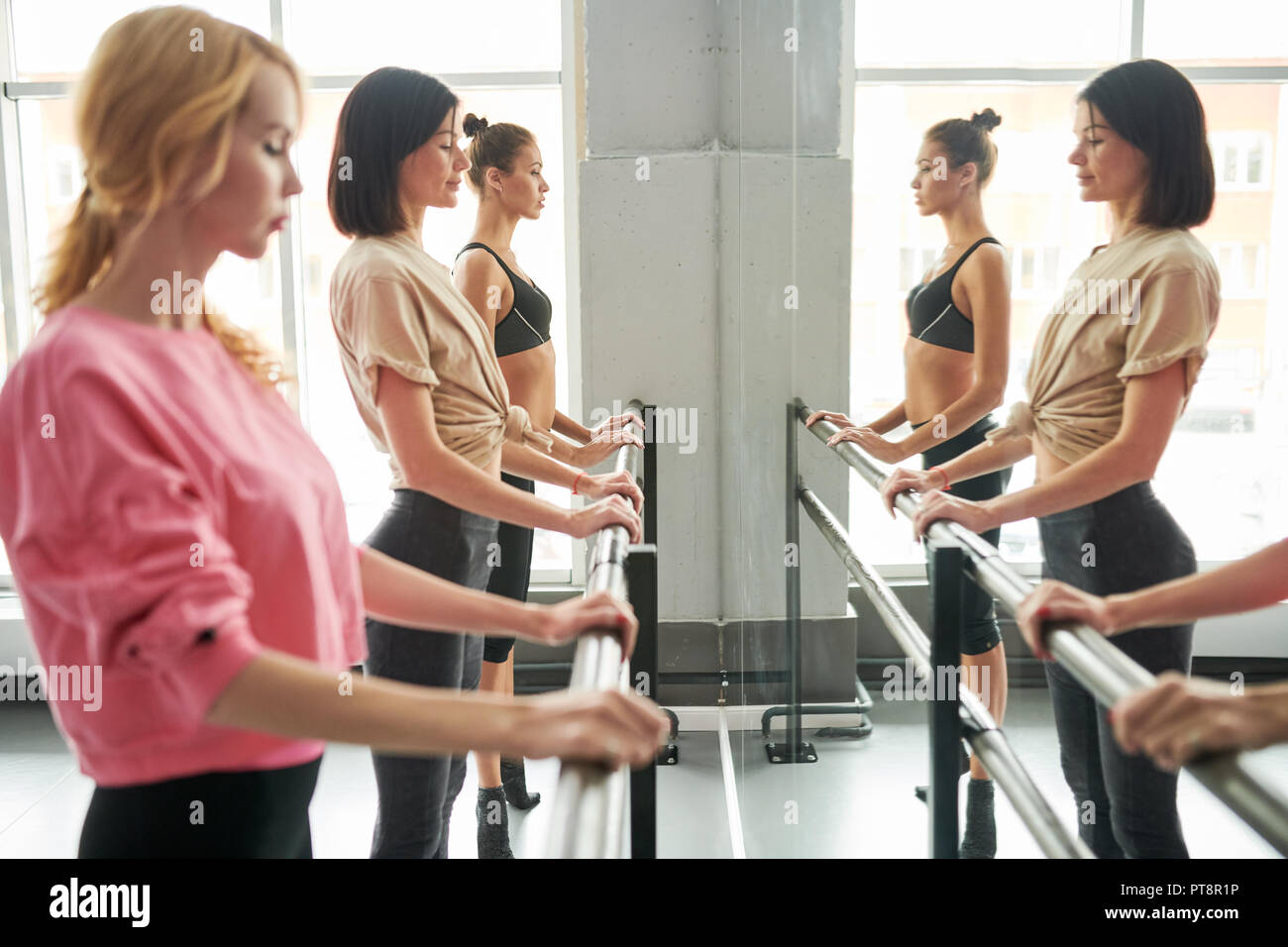 Row of Dancers at Bar Stock Photo - Alamy