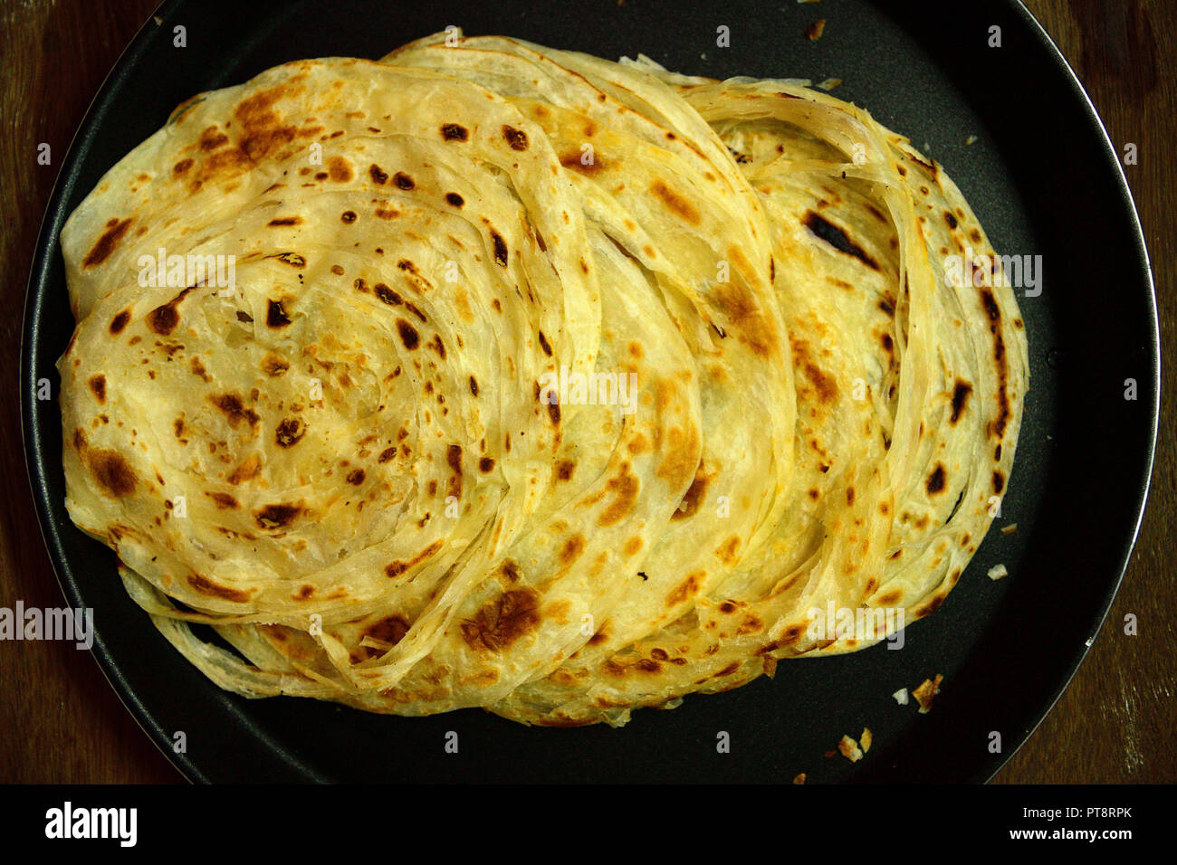 Kerala paratha / porotta / roti / parotta / barotta/ naan layered ...