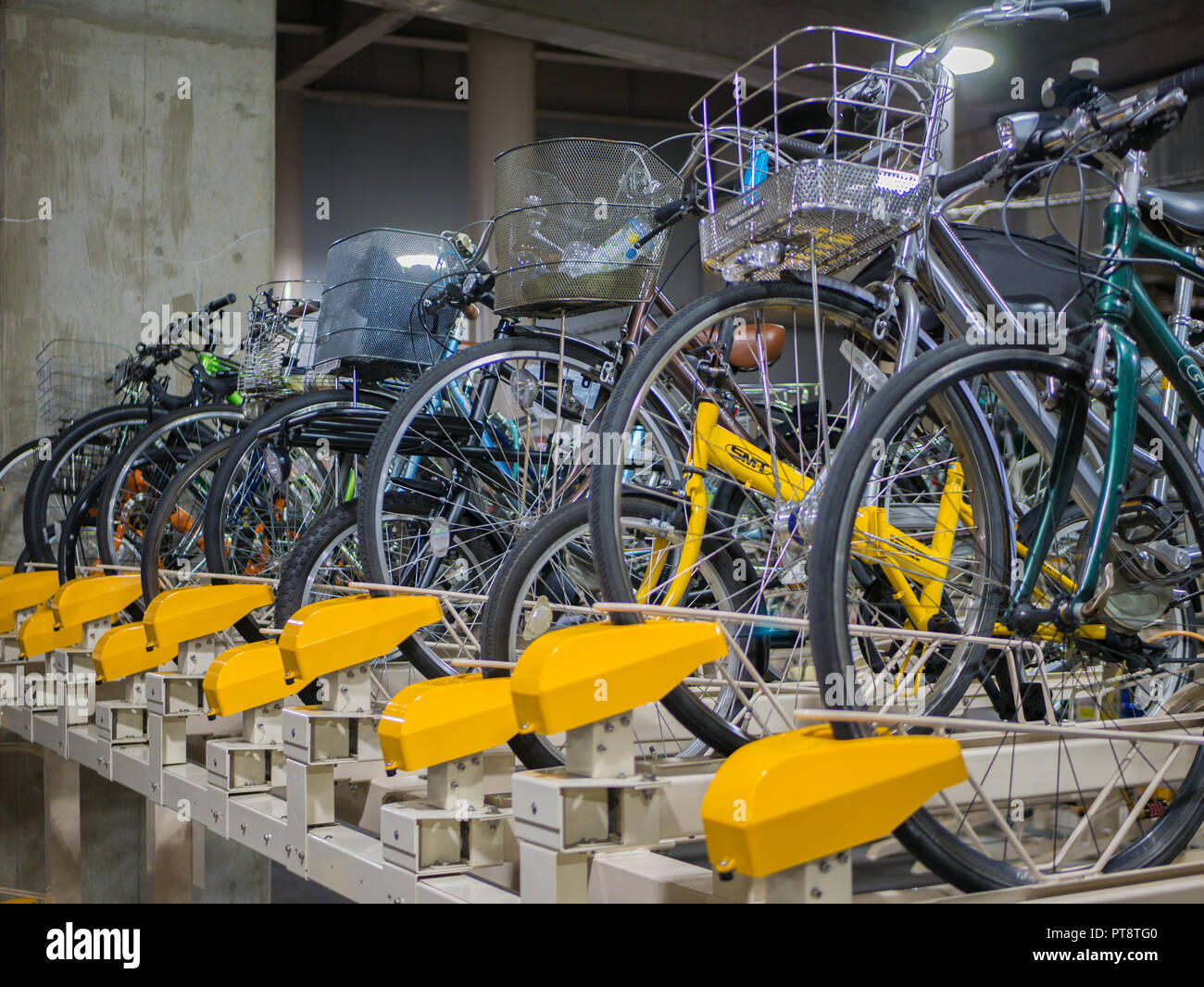 Two rows system of bicycles parking indoor garage near the Shinjuku ...