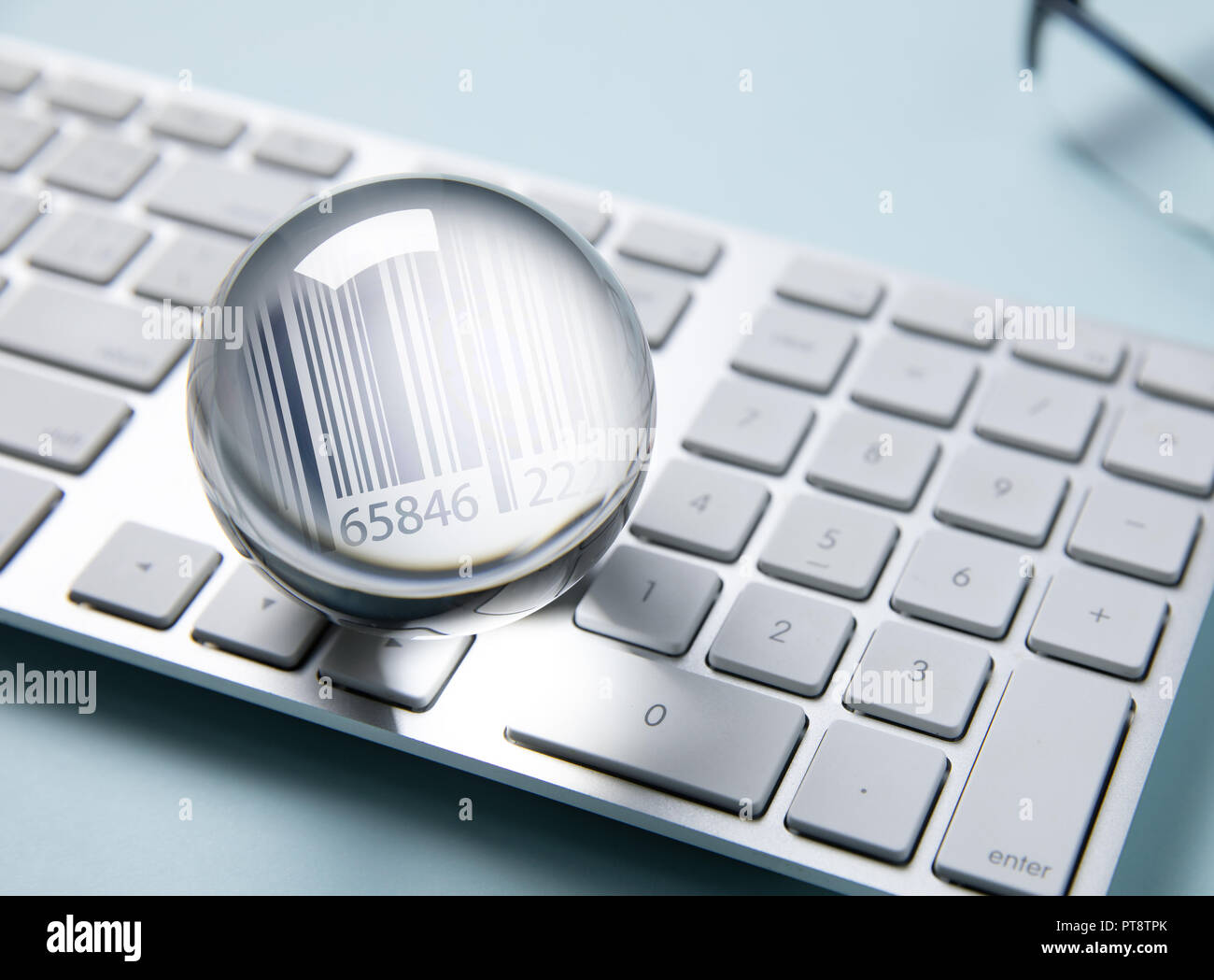 Barcode in clear crystal on white computer keyboard Stock Photo - Alamy