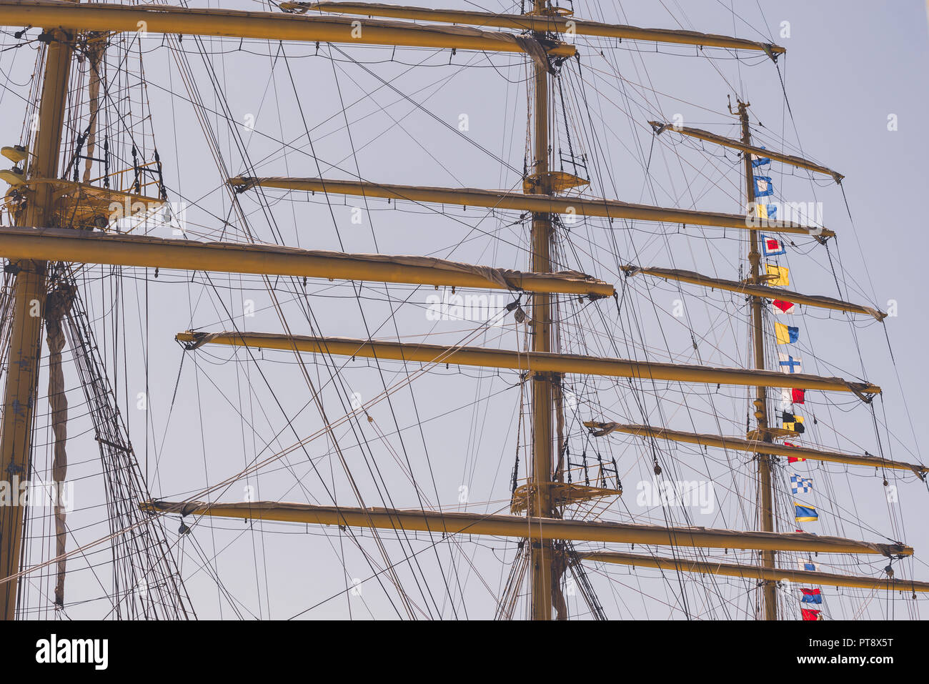 Colorful nautical sailing flags flying in the wind from the lines of a ...