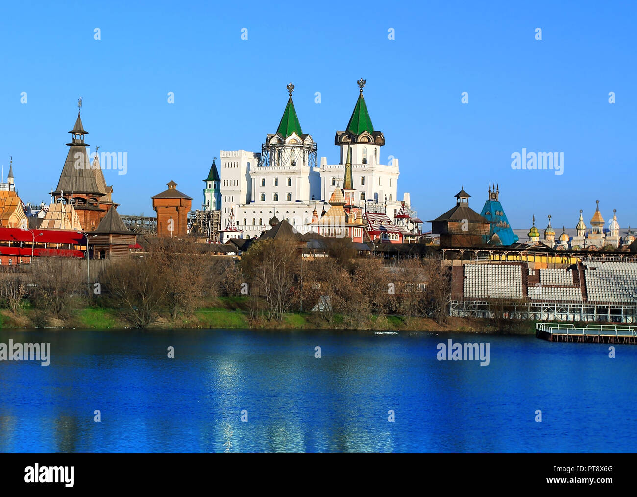 Ancient russian kremlin with colorful towers on the banks of the pond ...
