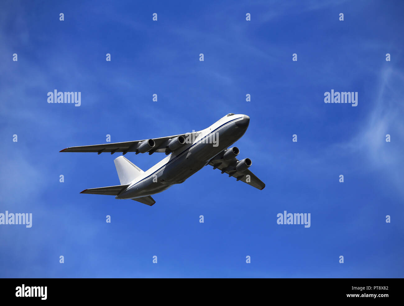 Large cargo aircraft gaining altitude after take-off Stock Photo - Alamy