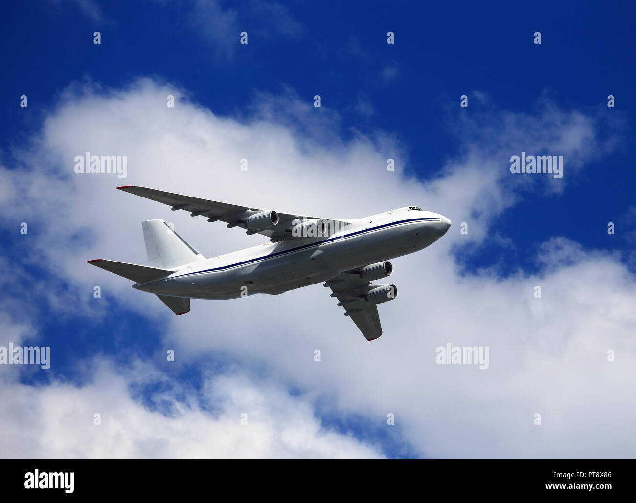 Large cargo aircraft gaining altitude after take-off Stock Photo - Alamy
