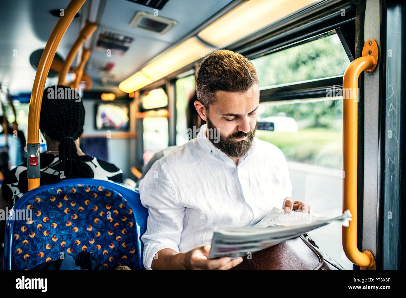 Man sitting on a bus hi-res stock photography and images - Alamy