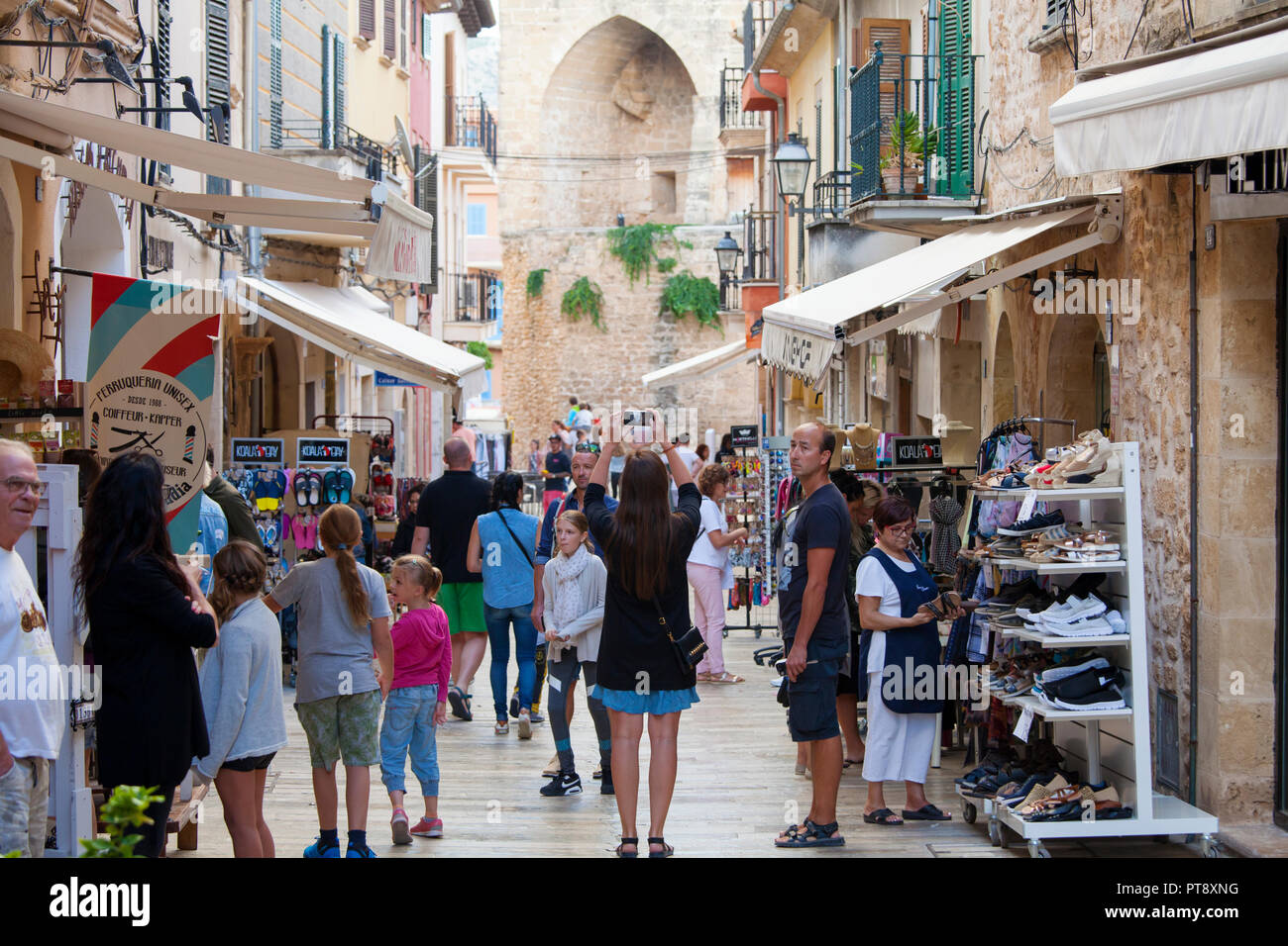 ALCUDIA, MAJORCA, SPAIN - October 2nd, 2018: People enjoy shopping and ...