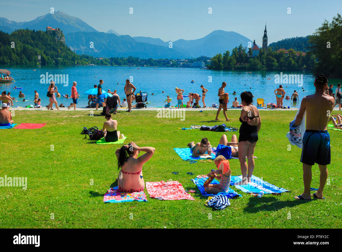 Sunbathers in a lake Stock Photo - Alamy
