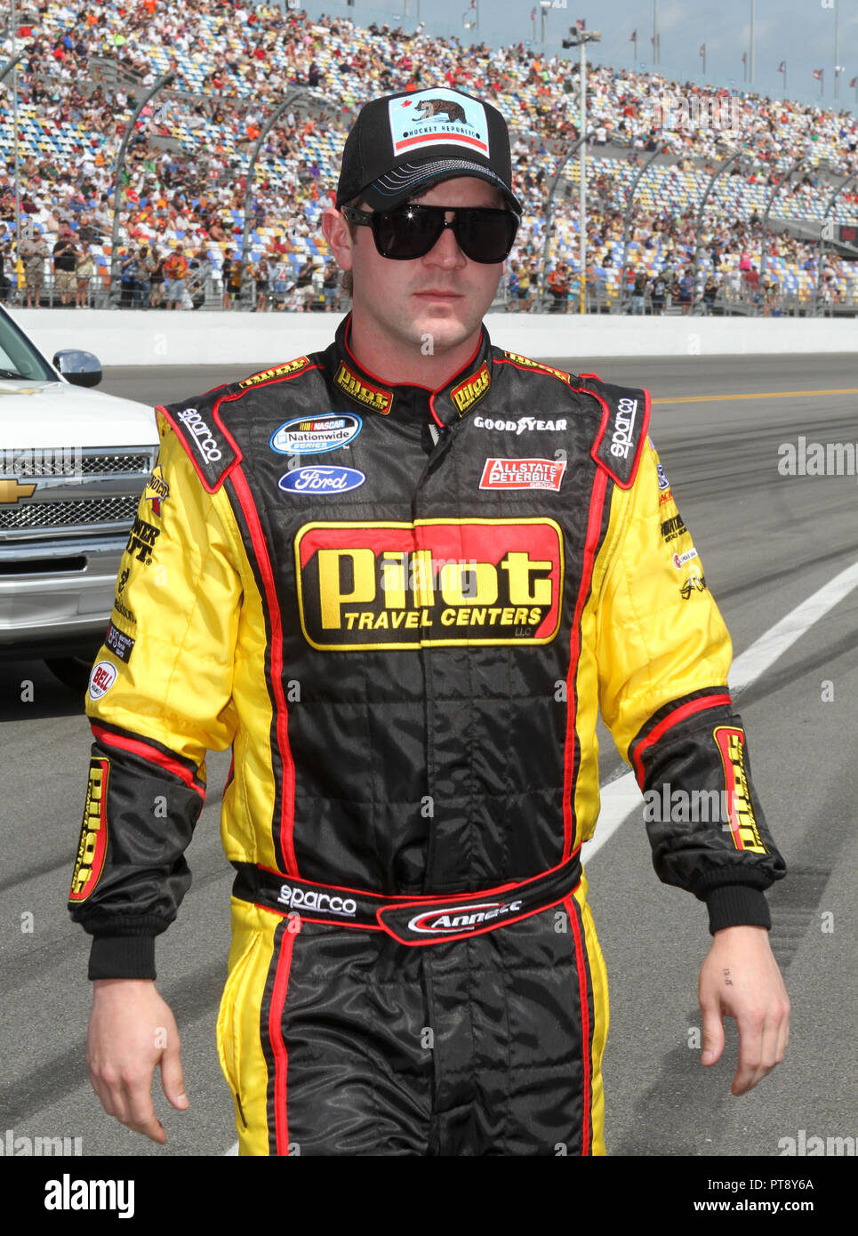 Michael Annett walks to his car on pit road prior to the start of the ...