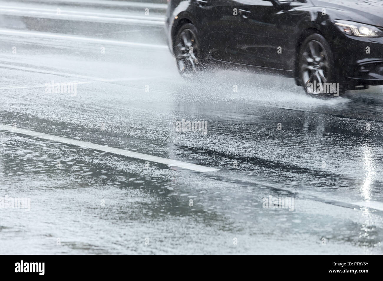 Wheels spraying water hi-res stock photography and images - Alamy