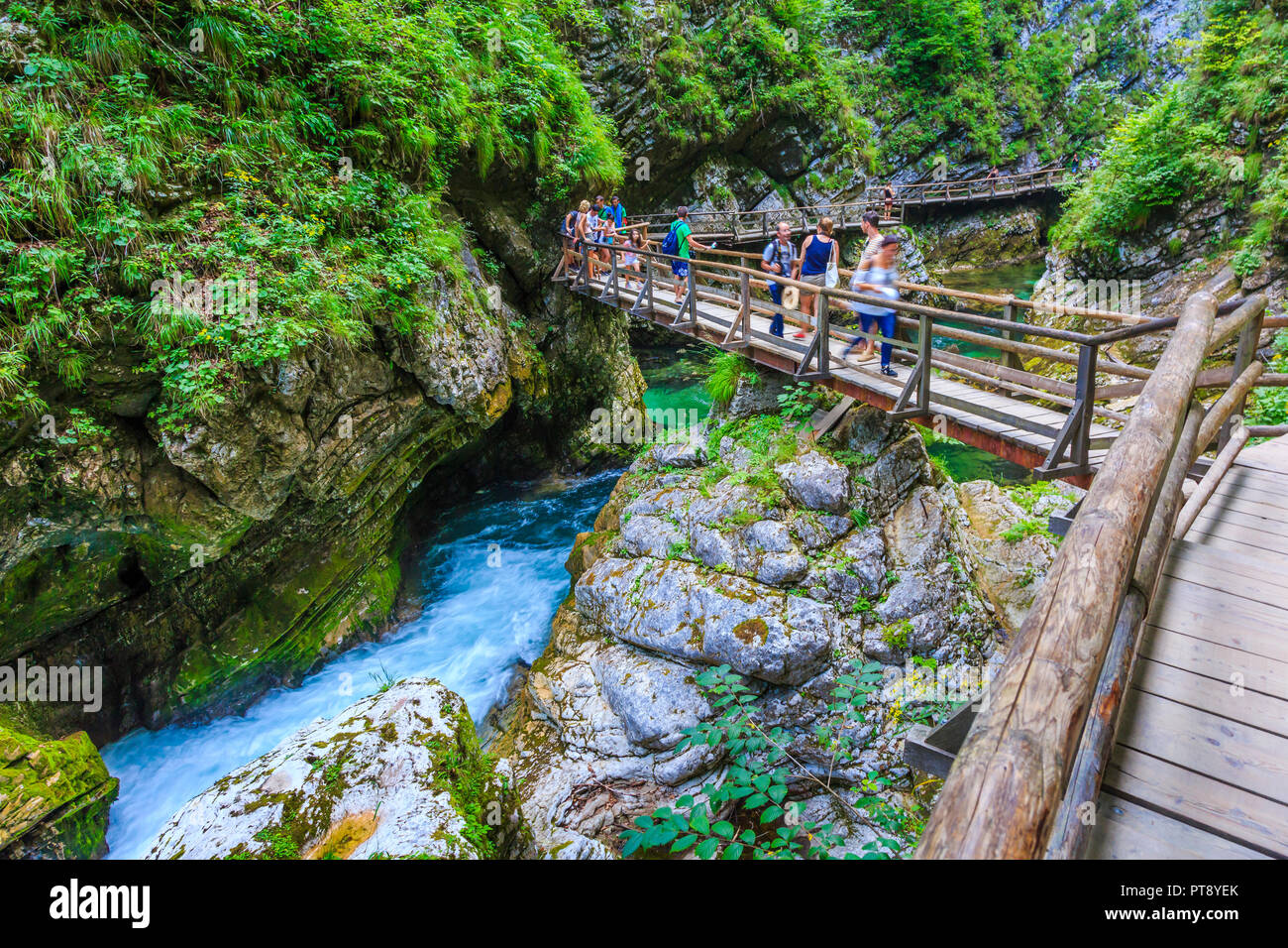 Gorge and people in a footbridge Stock Photo - Alamy