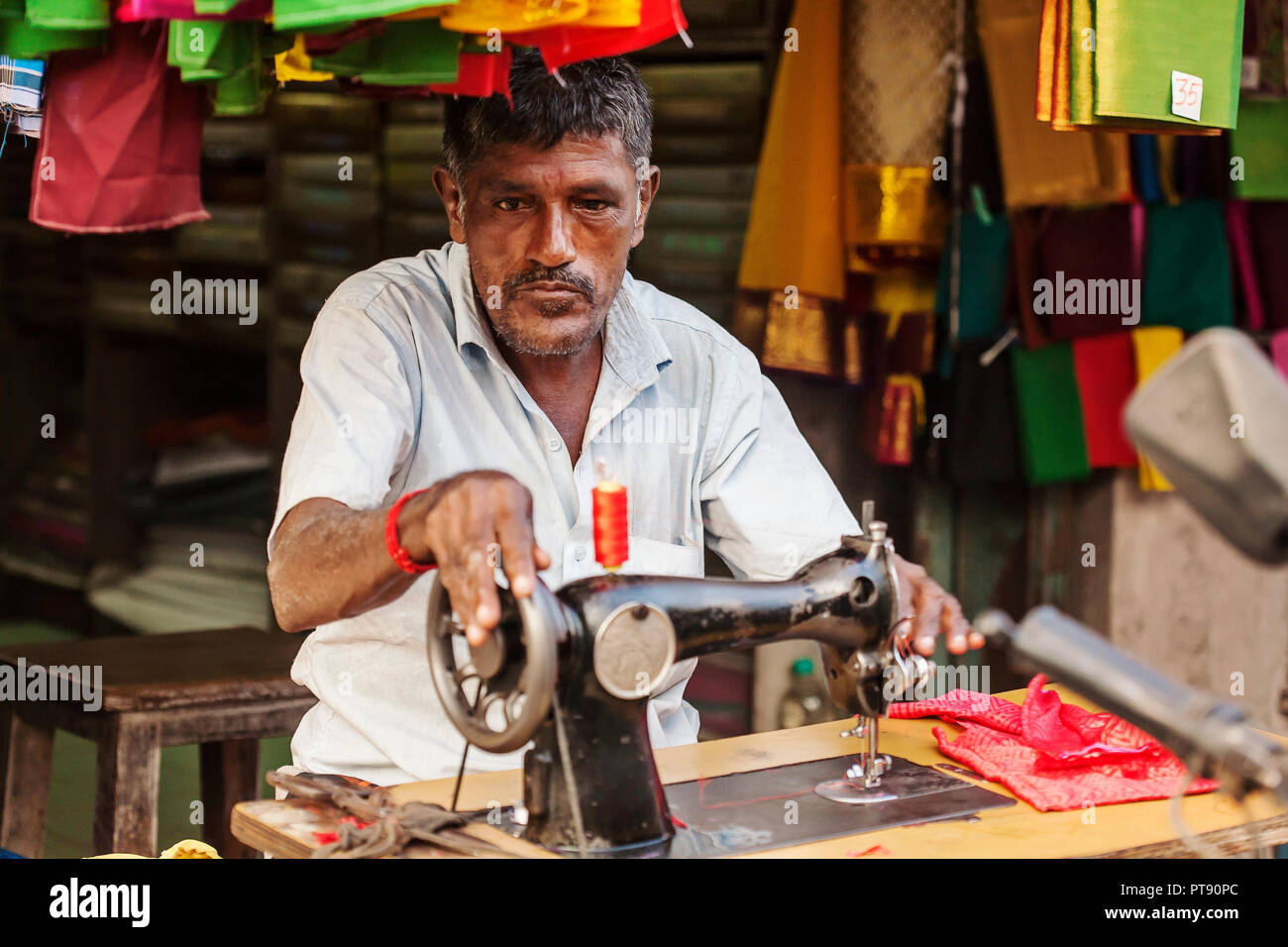 Indian man tailor machine hi-res stock photography and images - Alamy