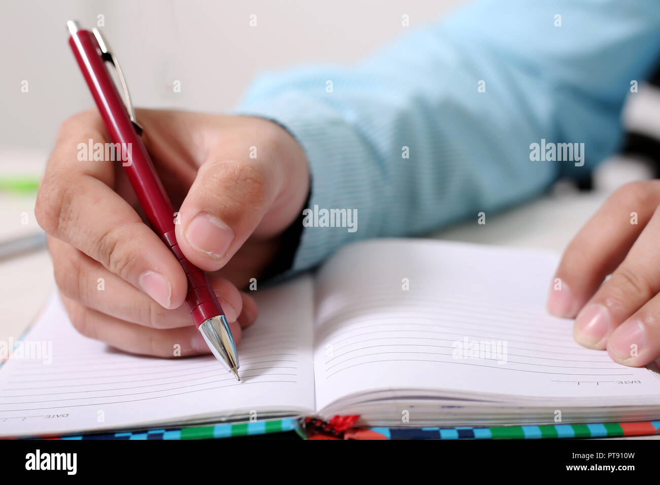 Work on notebook hi-res stock photography and images - Alamy