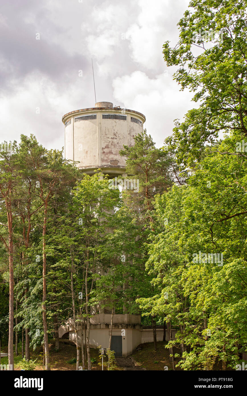 Abandoned brick tower in the green woods Stock Photo - Alamy