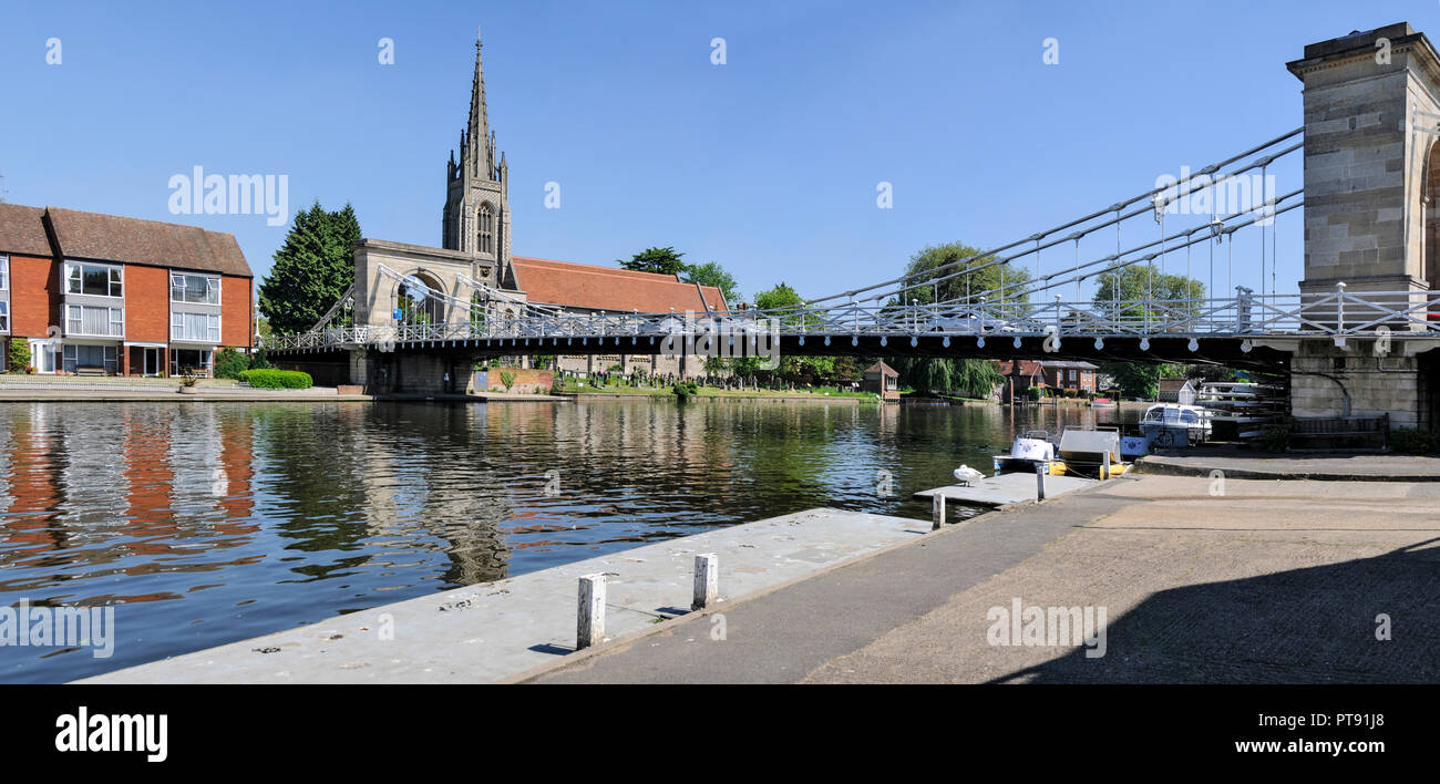 Marlow suspension bridge across the river Thames and All Saints Church ...