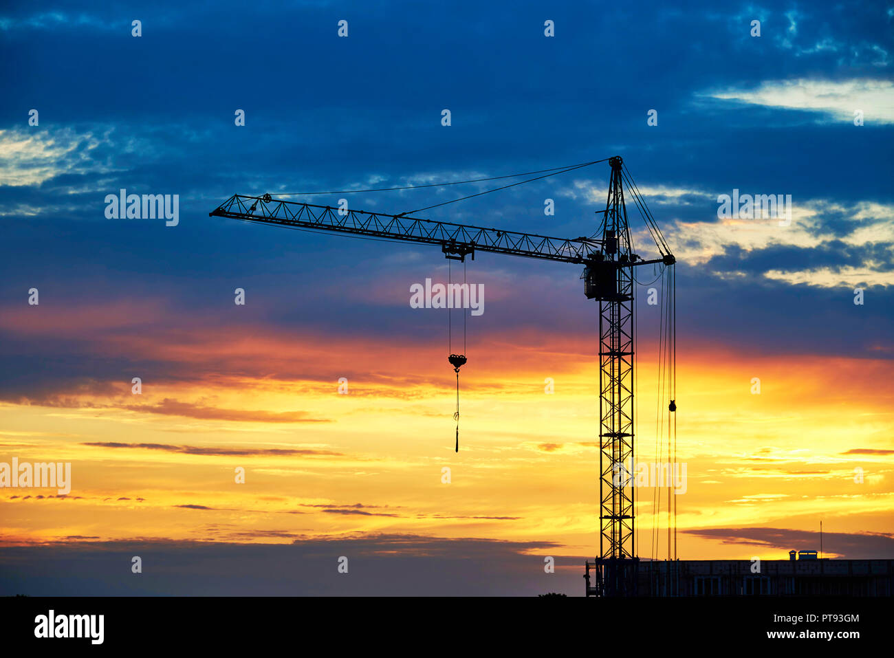 Tower crane against the background of a bright contrast sky Stock Photo ...