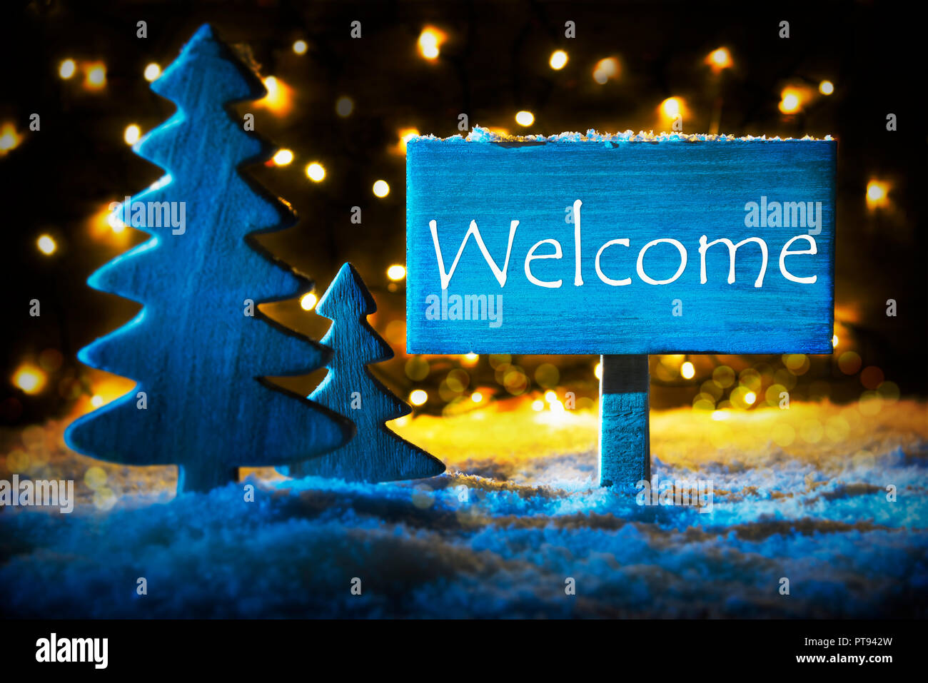 Blue Christmas Tree, English Text Welcome, Snow Stock Photo - Alamy