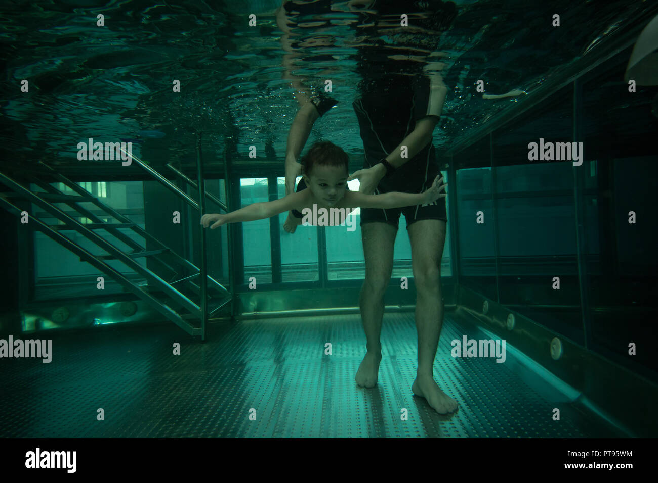 Baby swimming underwater hi-res stock photography and images - Alamy