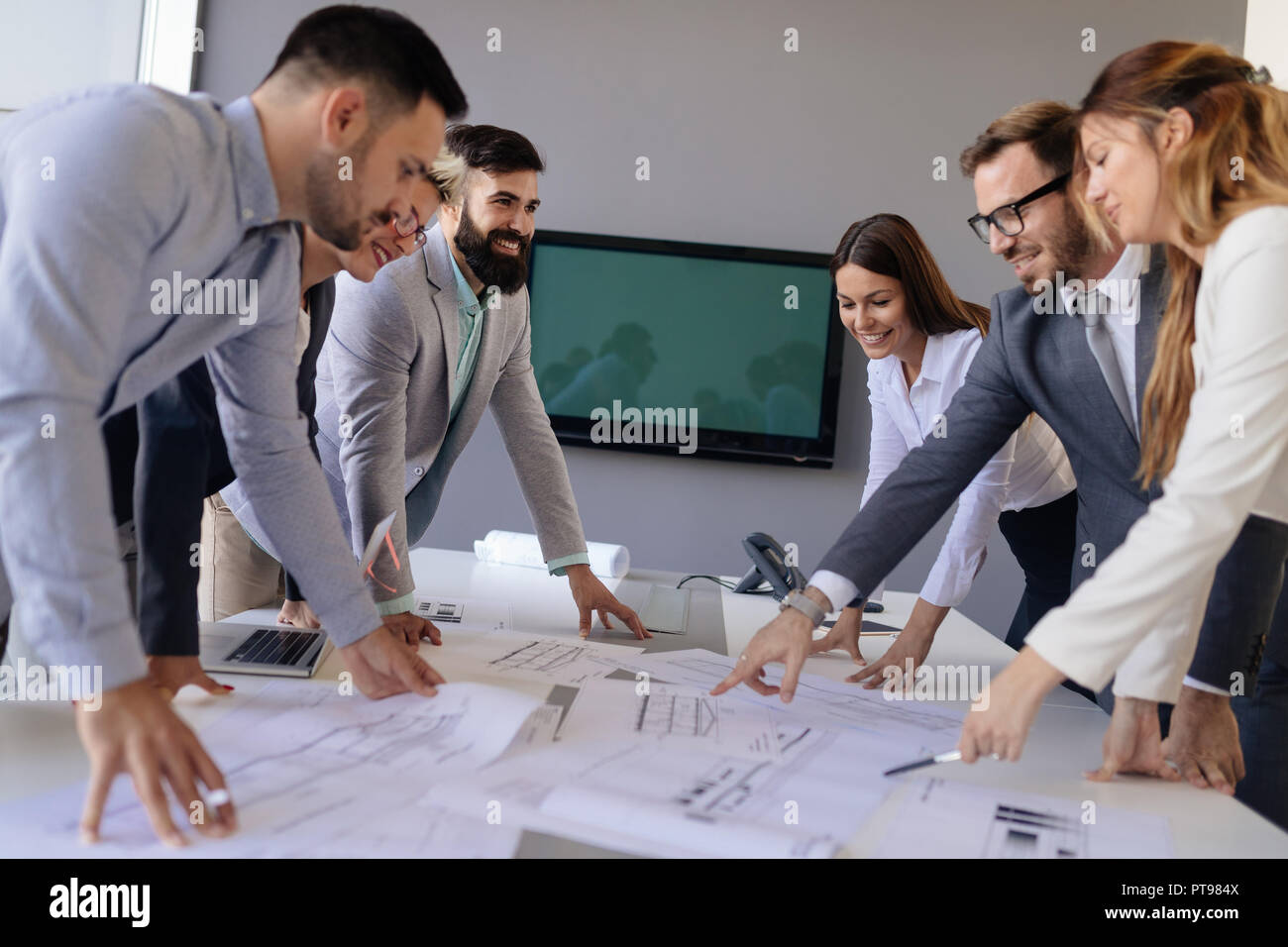 Group of business people collaborating in office Stock Photo - Alamy Group of business people collaborating in office Stock Photo - Alamy