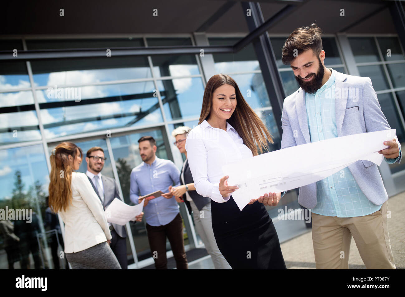 Businessman discussing over documents hi-res stock photography and ...